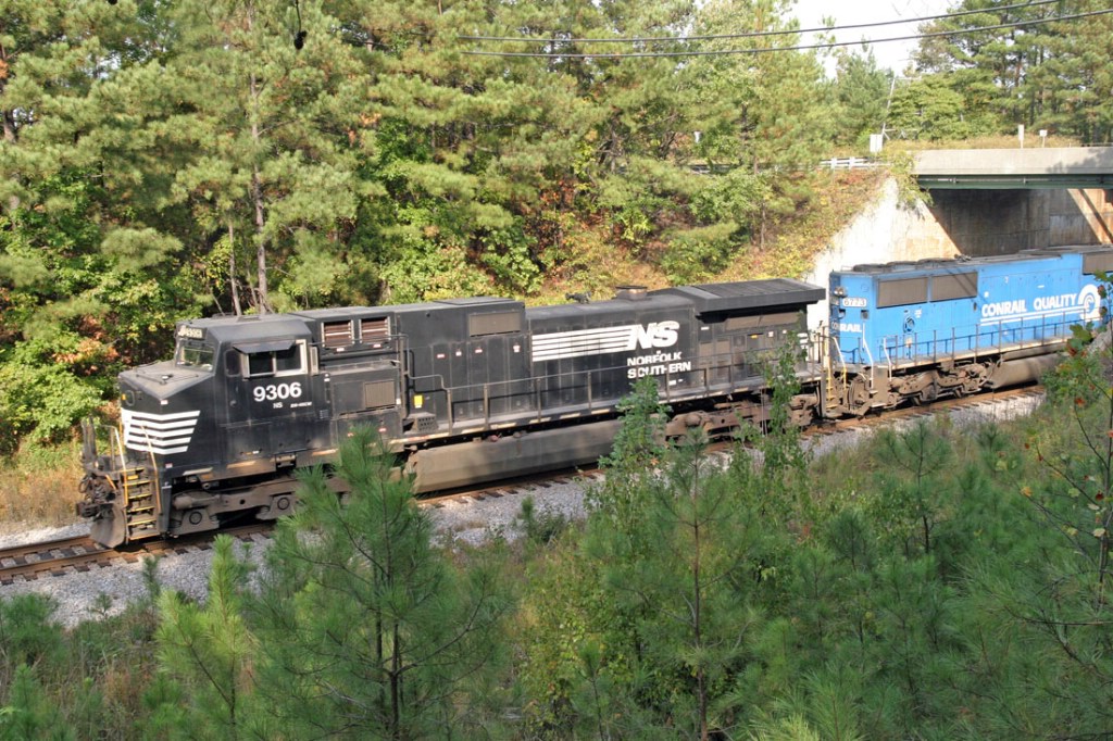 NS Train #387 blast's under the CSX at Collier Yard.